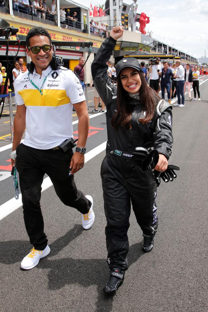 Saudi woman drives F1 car - أخبار السعودية | صحيفة عكاظ